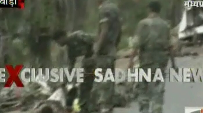 First Pics: Naxals blow up bus near Dantewada First Pics: Naxals blow up bus near Dantewada